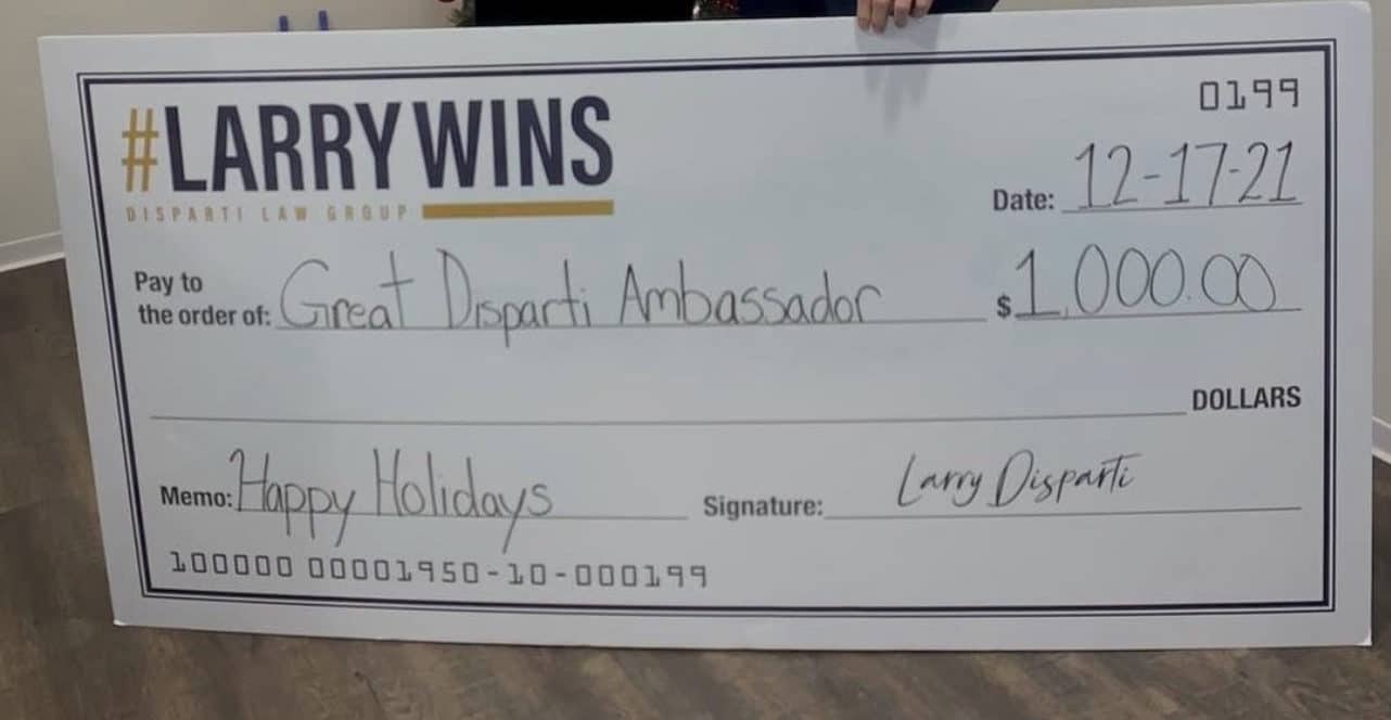 Larry Cares: Larry Disparti surprises Ambassadors with Holiday Check ...
